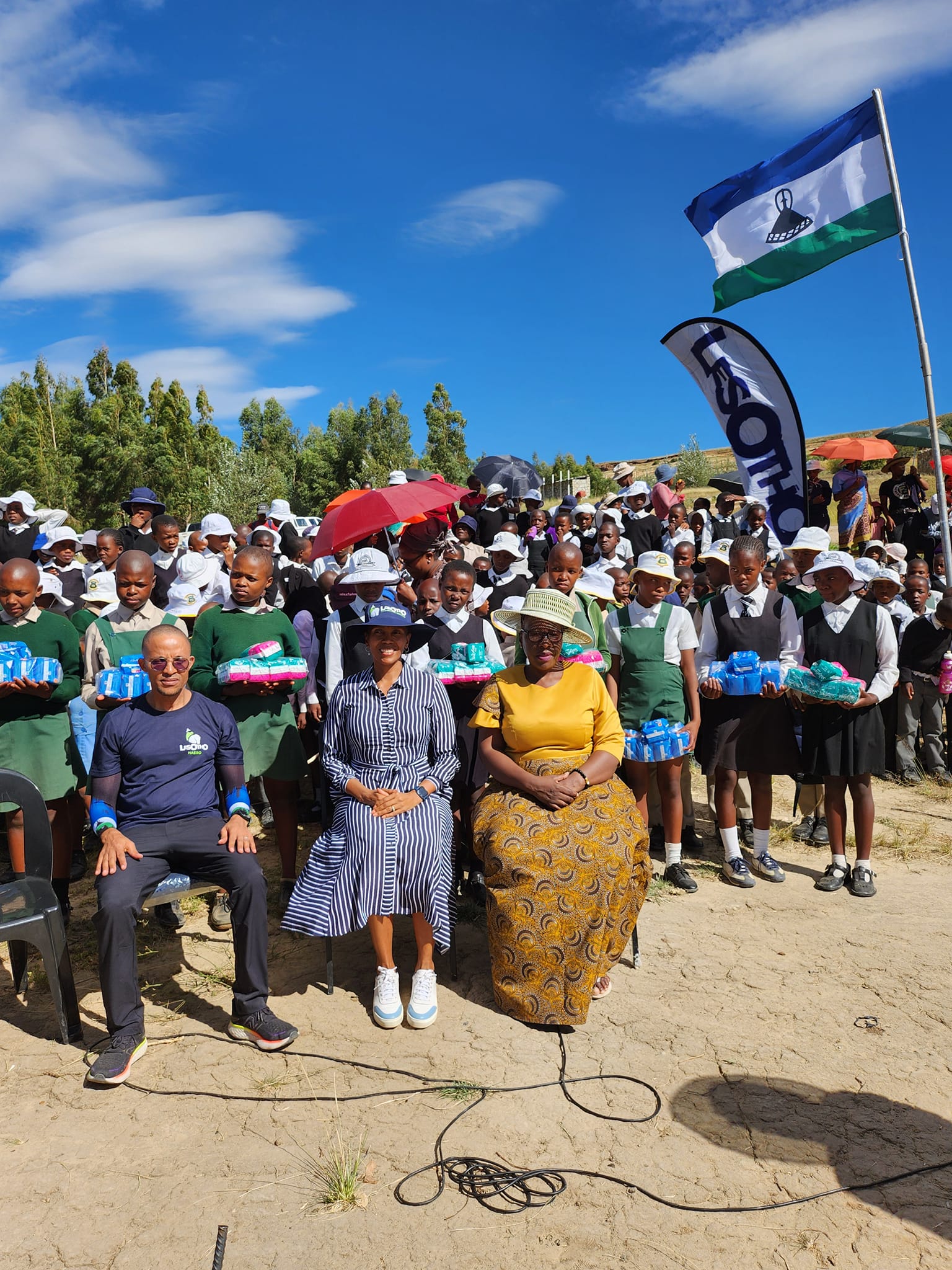 HER MAJESTY PRESENTS SANITARY PADS, SCHOOL BAGS - Government of Lesotho